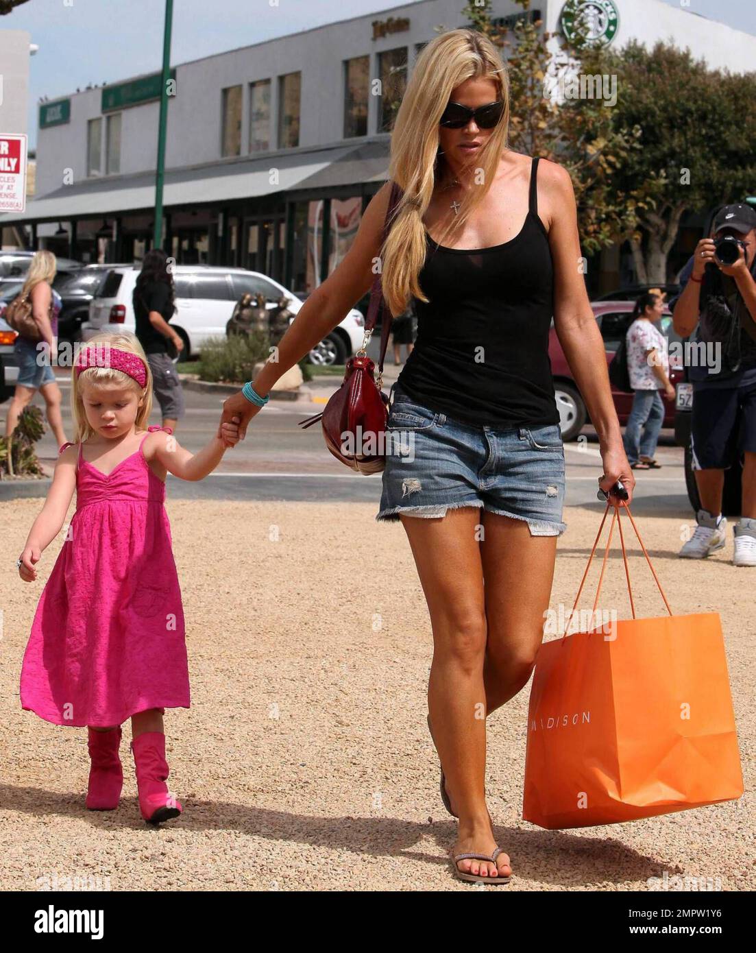- Actress Denise Richards and her father head out for a day of shopping with her two daughters ...