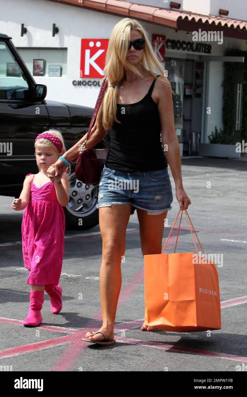 - Actress Denise Richards and her father head out for a day of shopping with her two daughters ...