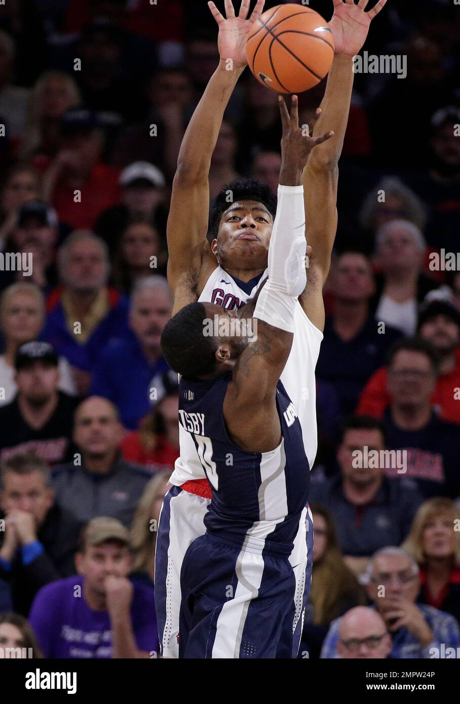 Utah State guard DeAngelo Isby (0) attempts a shot against Gonzaga ...