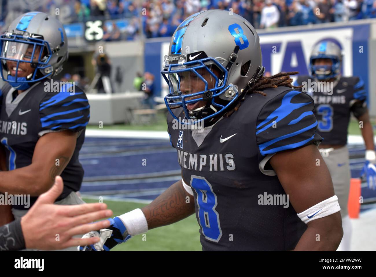 Memphis running back Darrell Henderson (8) celebrates after scoring a ...