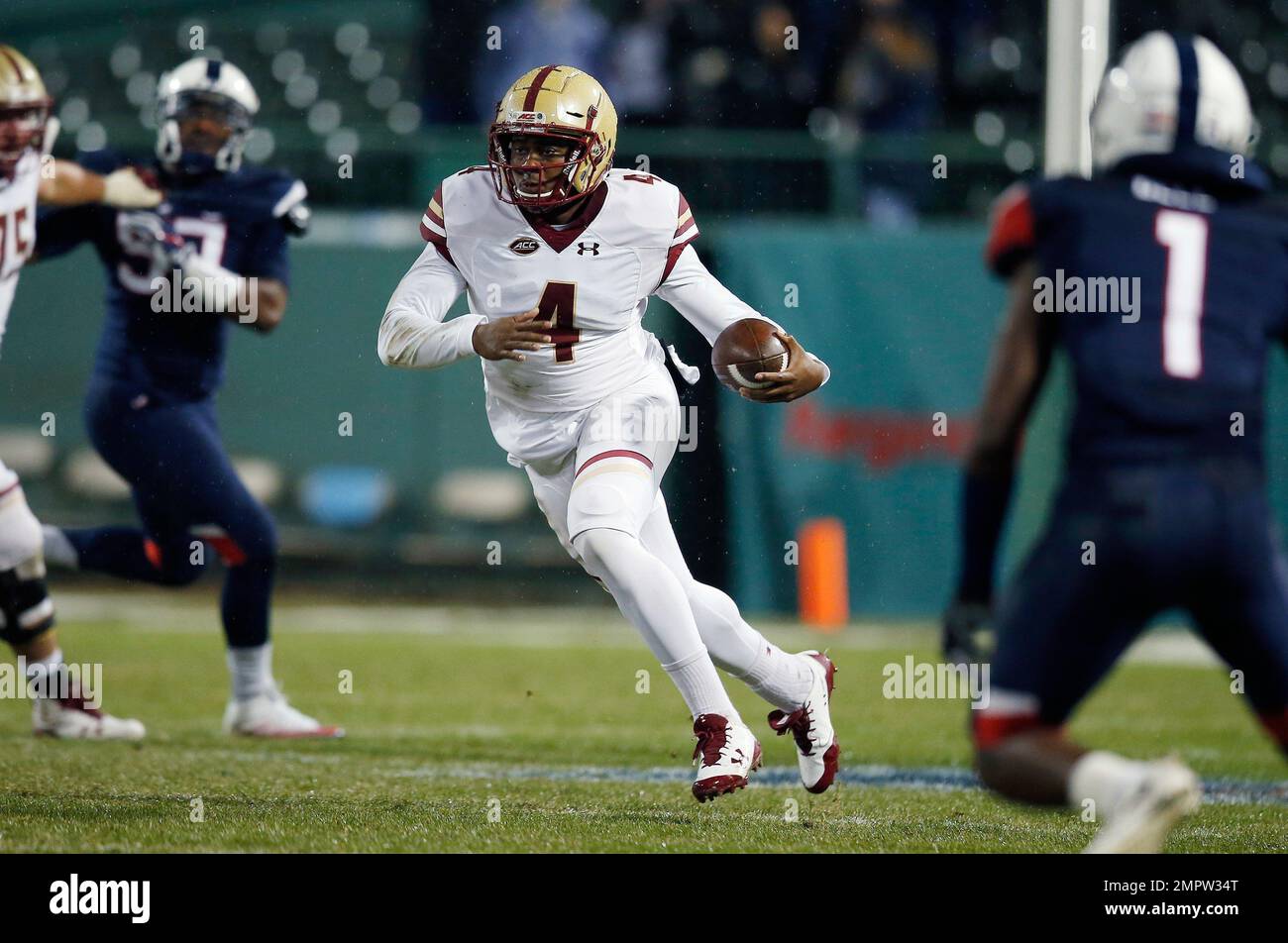 Boston College quarterback Darius Wade (4) carries the ball during the ...