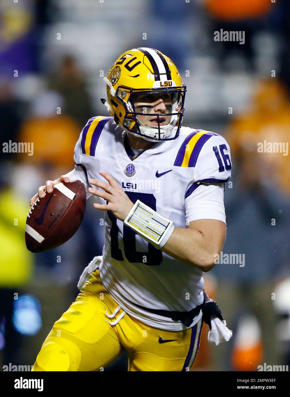 LSU quarterback Danny Etling (16) rolls out to pass during the second ...