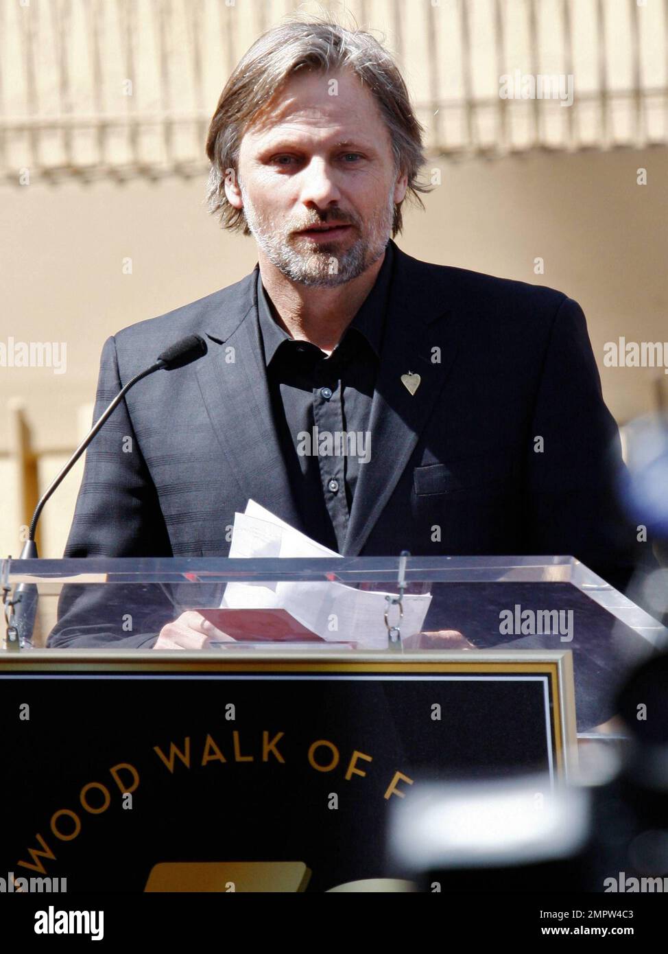 A frail looking Dennis Hopper is awarded a star on the Hollywood Walk ...