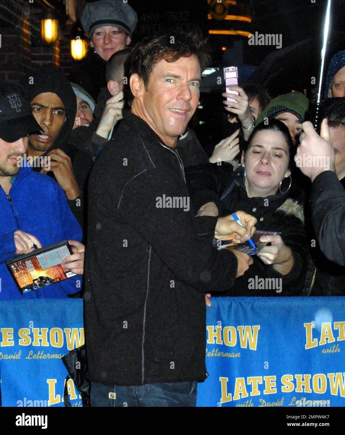 Dennis Quaid and Sean "P-Diddy" Combs sign autographs and pose for fans ...