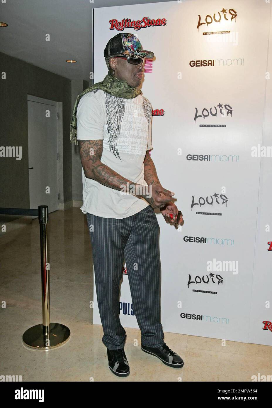 Dennis Rodman shows he is still a hit with the ladies as he attends the ...