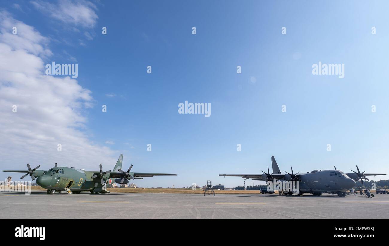 A Japan Self-Defense Force C-130 Hercules aircraft (left) assigned to ...
