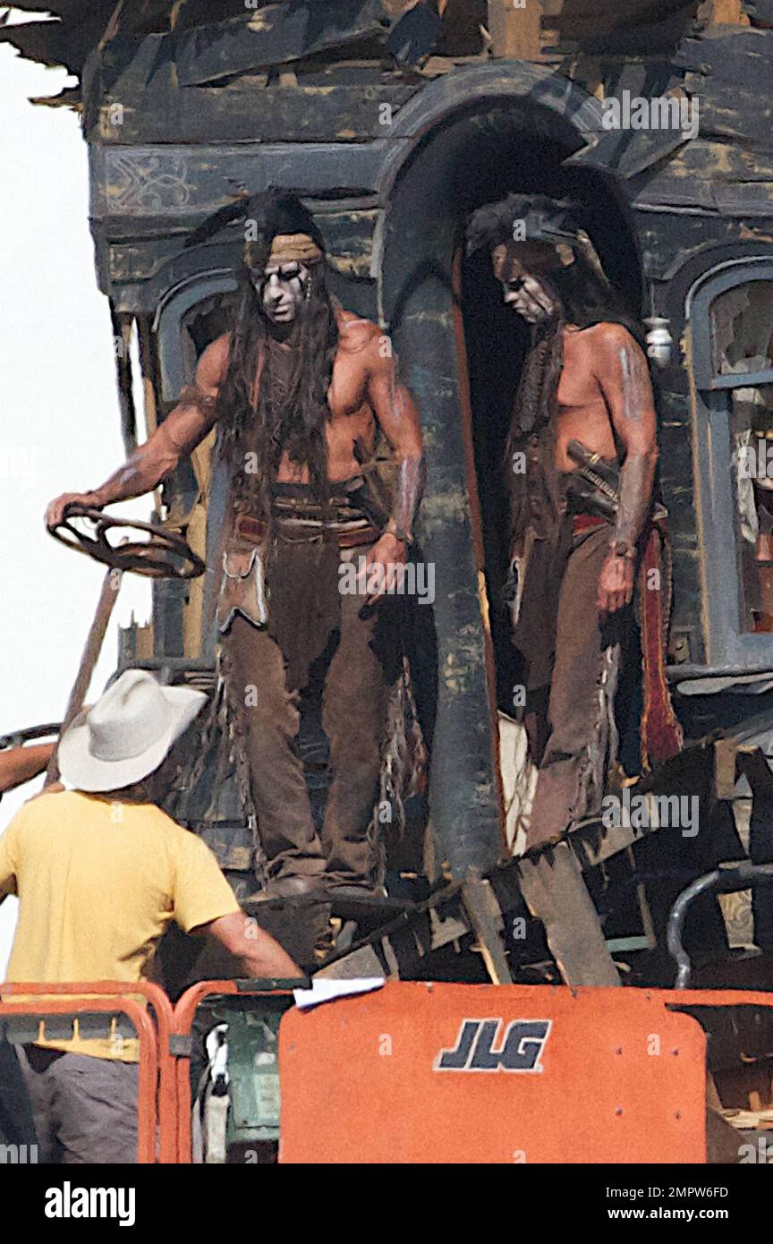 Johnny Depp and Armie Hammer, dressed in their characters Tonto and the ...