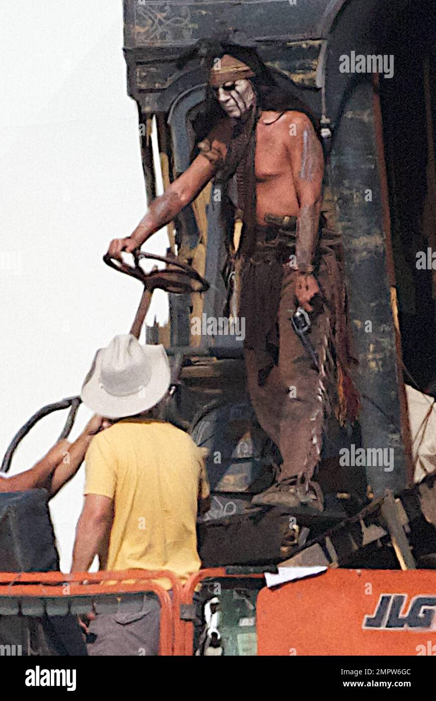 Johnny Depp and Armie Hammer, dressed in their characters Tonto and the ...