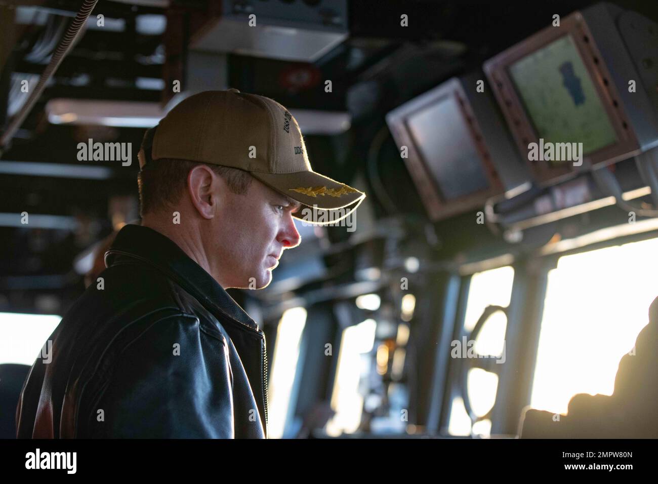 Executive Officer Cmdr. Cameron Ingram oversees the bridge team in the ...