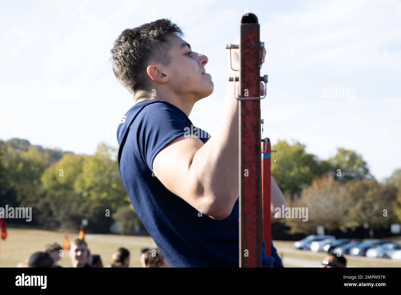 A future Marine conducts pull-ups during the Marine Corps Recruiting ...