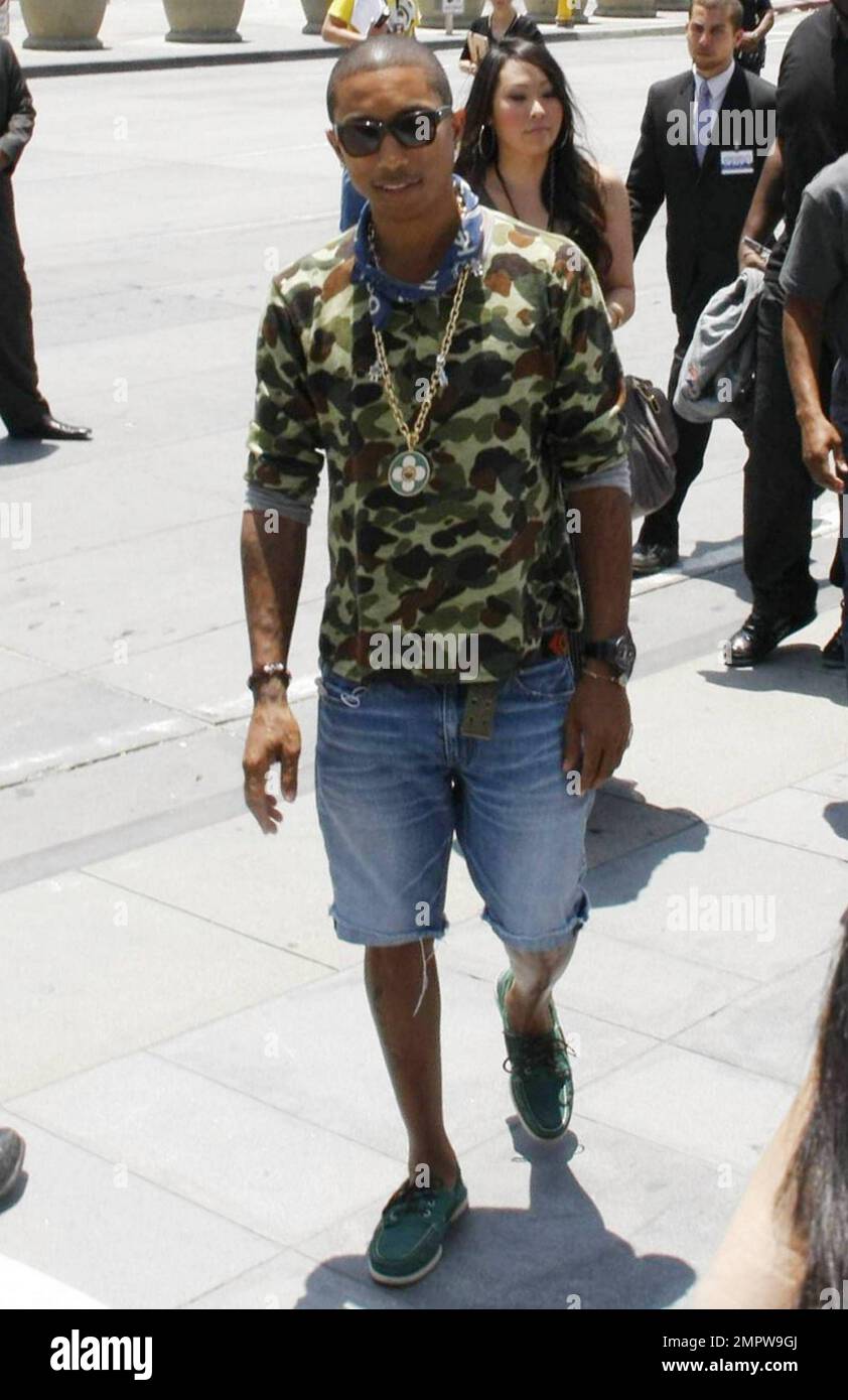 Pharrell Williams arrives at Nokia Theatre L.A. Live for the premiere ...