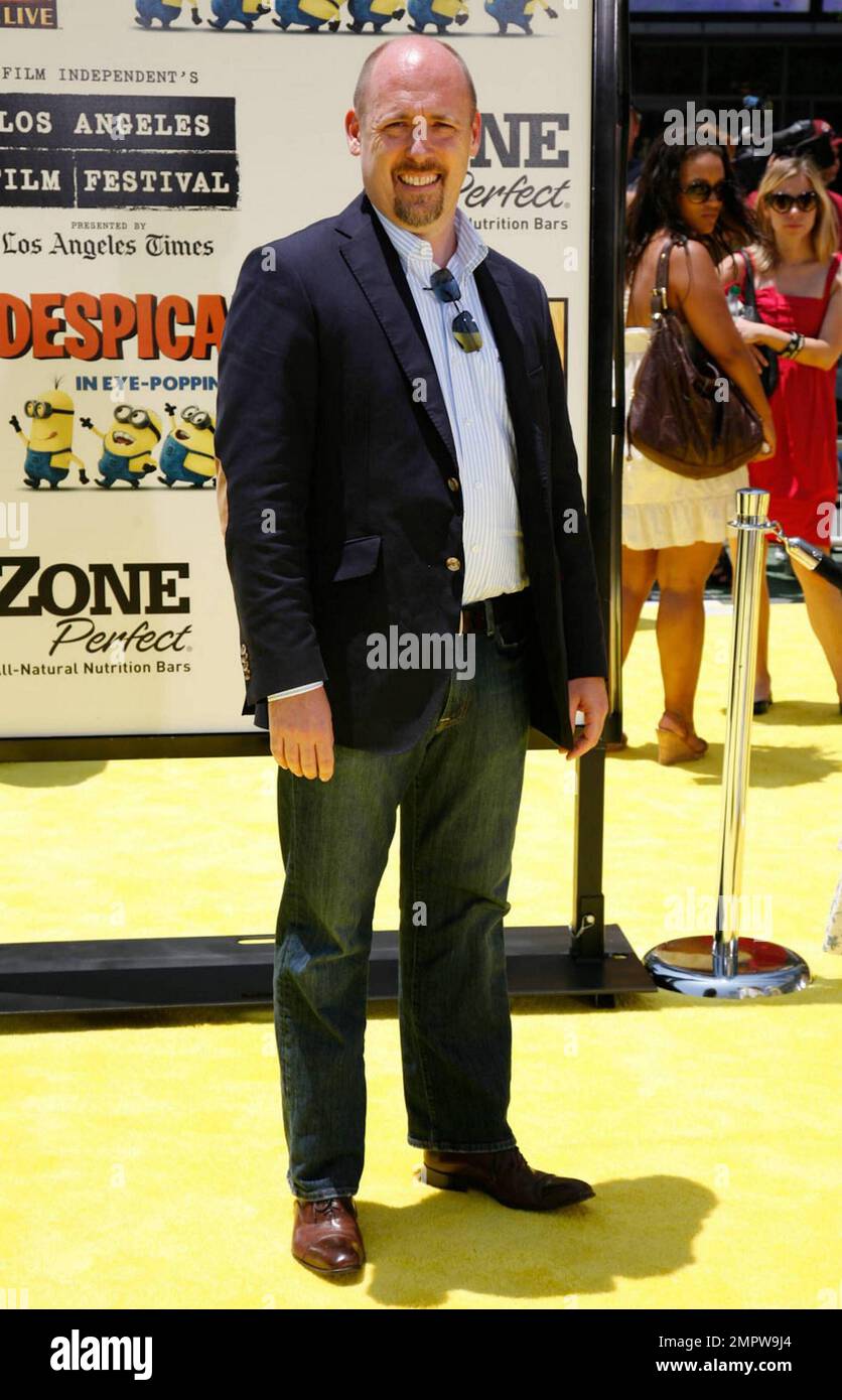 Director Chris Renaud poses on the yellow carpet at the premiere of ...