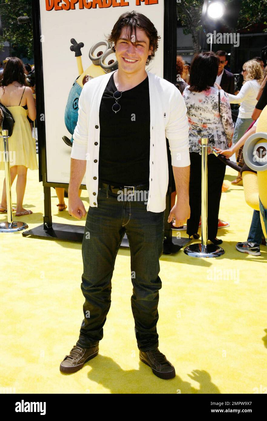 Actor Logan Huffman poses on the yellow carpet at the premiere of ...