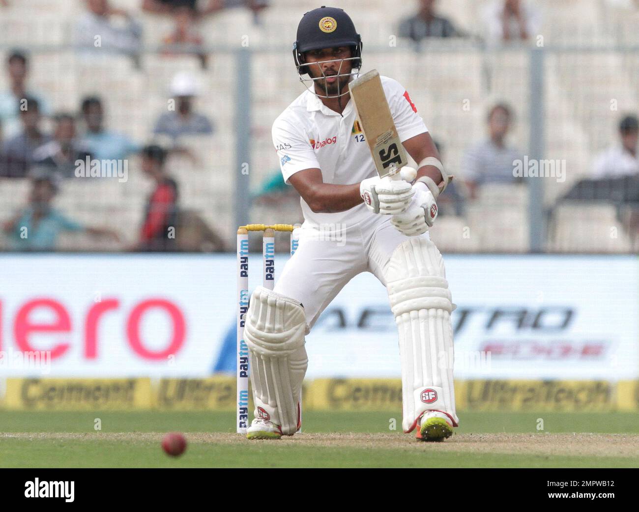 Sri Lanka's captain Dinesh Chandimal plays a shot during the third day ...