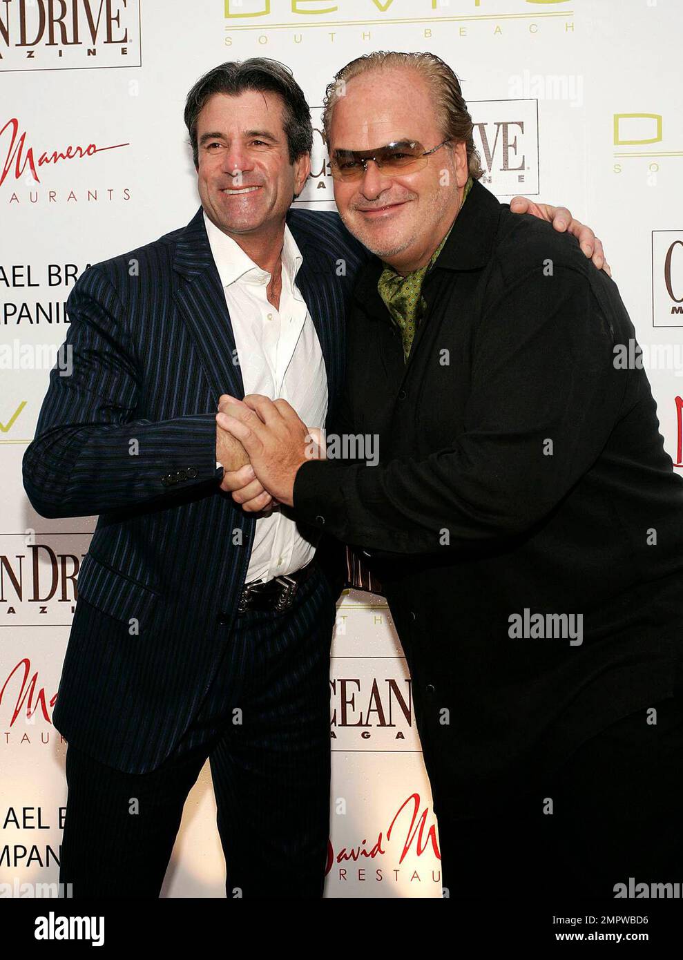 Co-owners David Manero (R) and Michael Brauser arrive for the grand ...