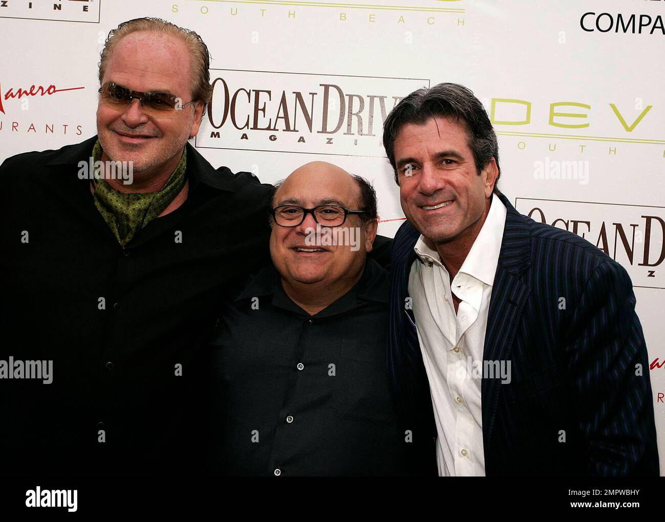 Co-owners David Manero (L), Danny DeVito and Michael Brauser (R) arrive ...