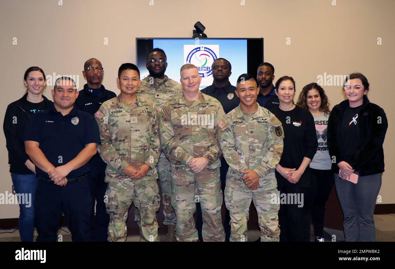 Students and instructors (center) posed for a photo during the ...