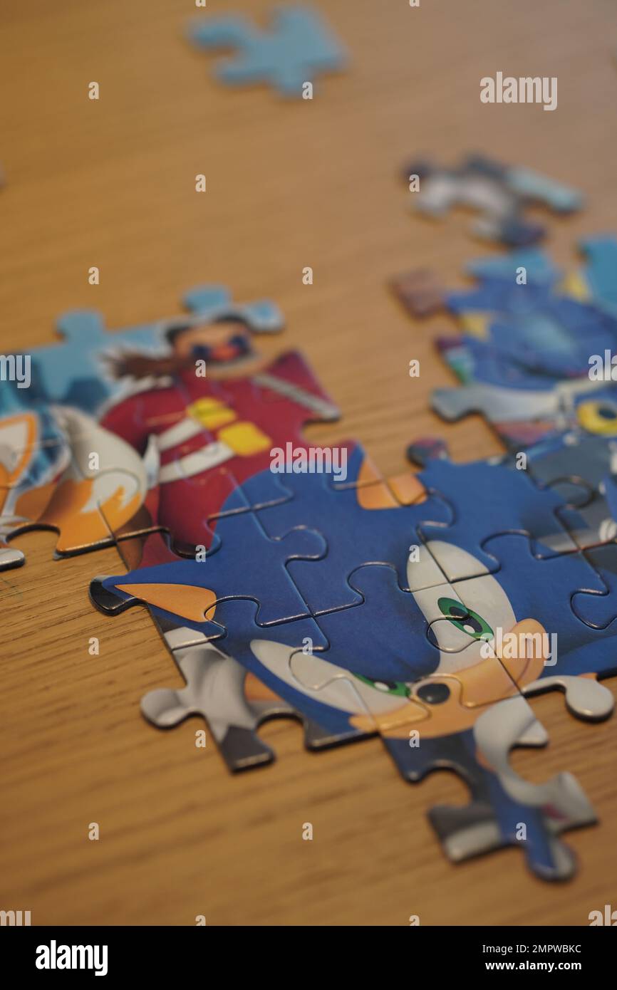 A vertical shot of puzzle pieces showing Sonic The Hedgehog Stock Photo ...