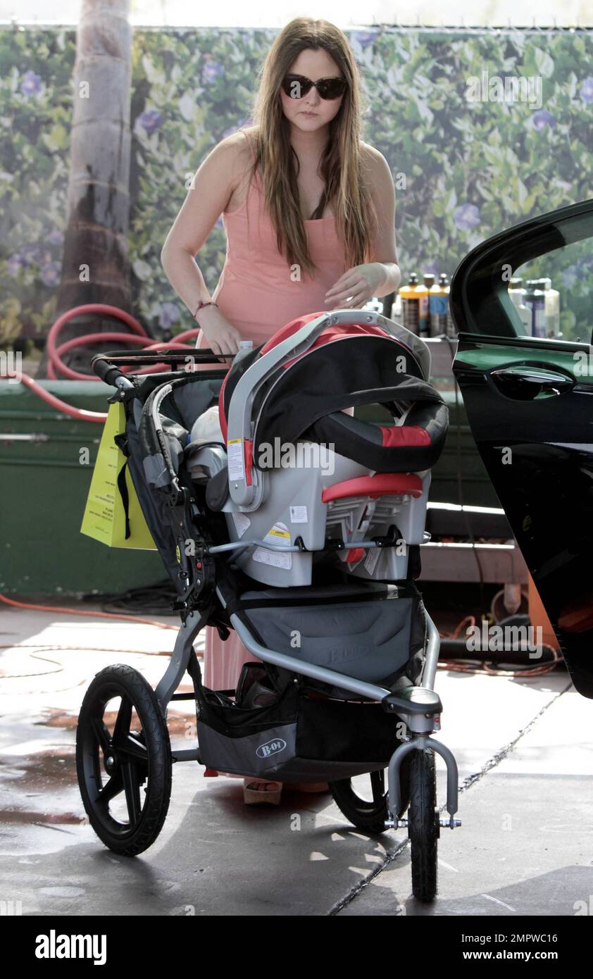 Actress Devon Aoki and finance James Bailey take their son out for a ...