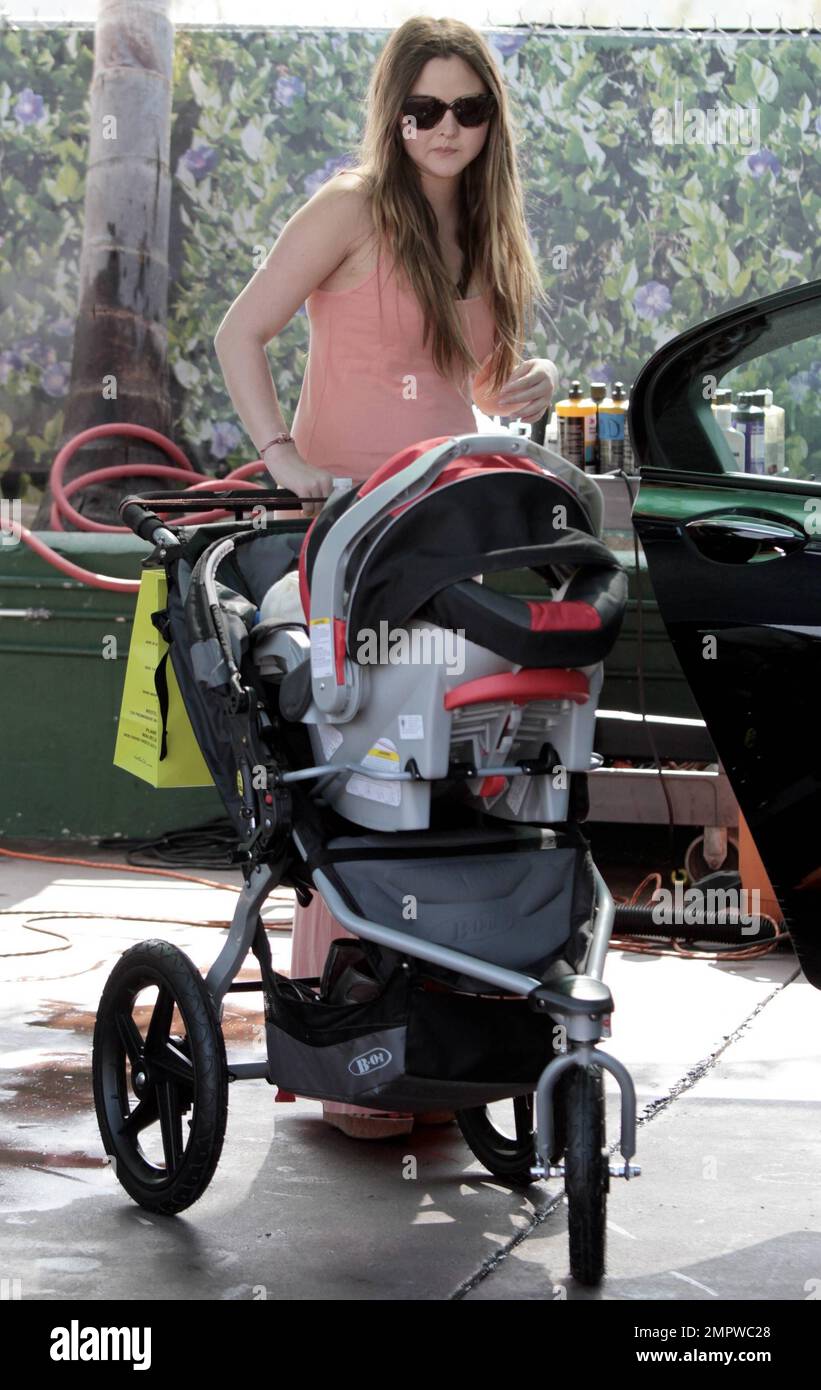 Actress Devon Aoki and finance James Bailey take their son out for a ...