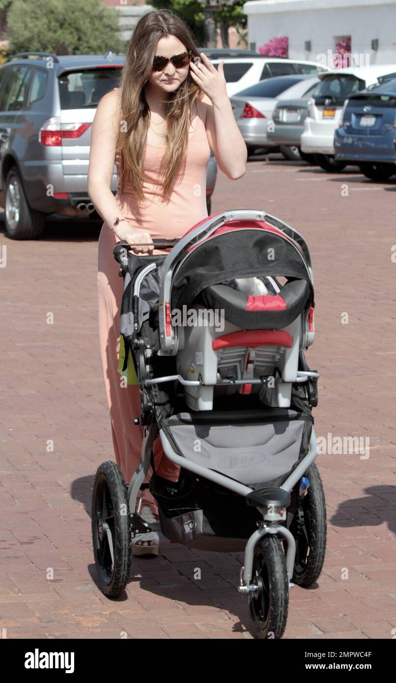 Actress Devon Aoki and finance James Bailey take their son out for a ...
