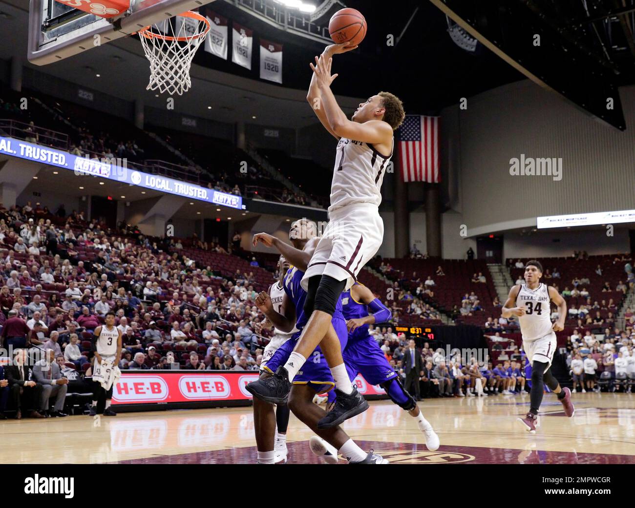 Texas A&M forward DJ Hogg (1) shoots over UC Santa Barbara forward ...