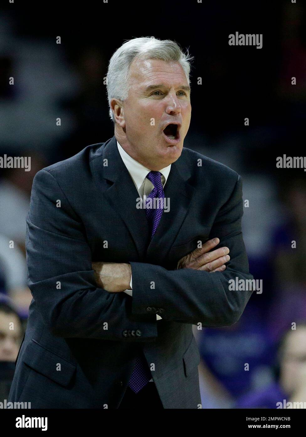 Kansas State head coach Bruce Weber talks to his players during the ...