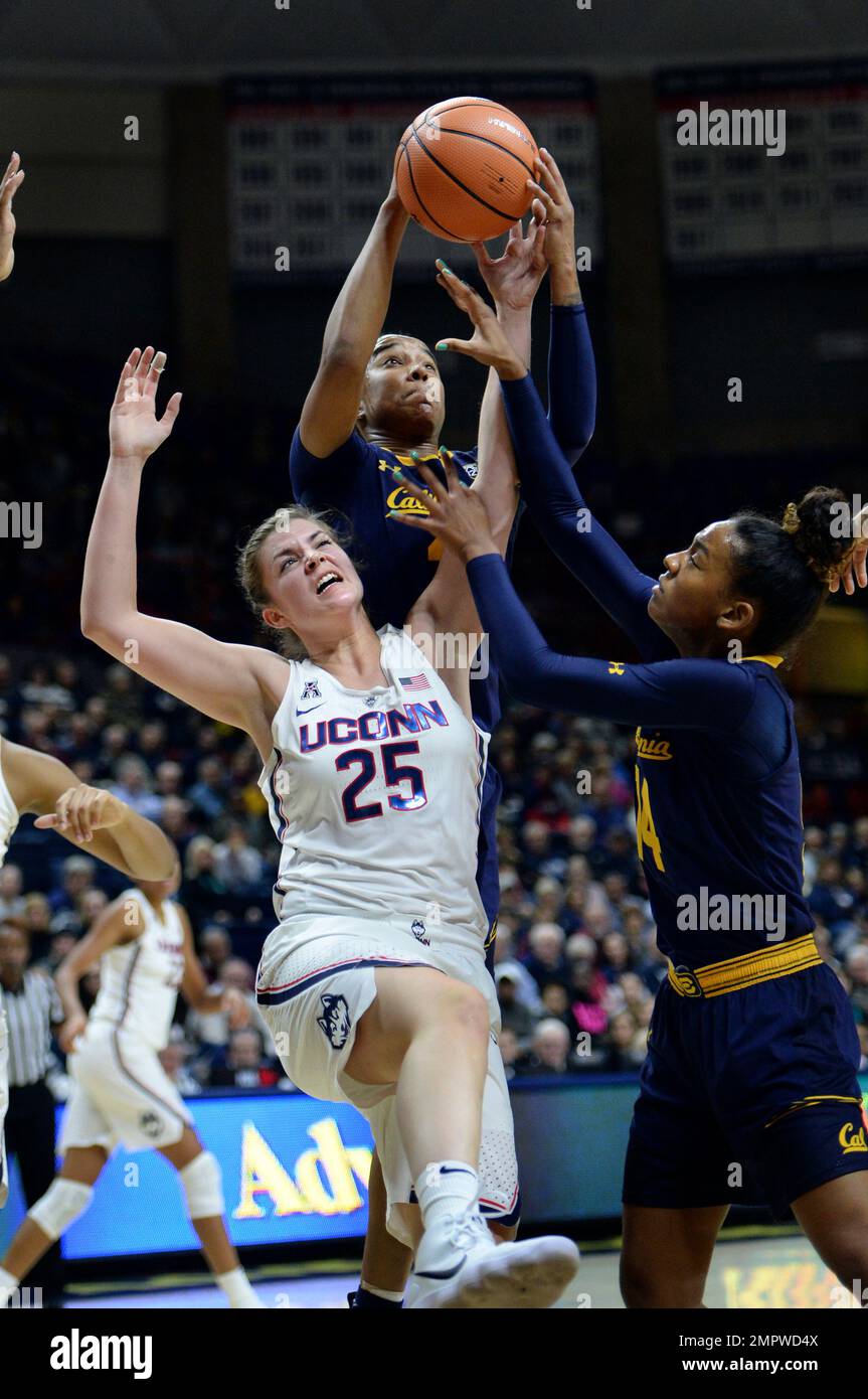Connecticut's Kyla Irwin (25) fights for a rebound against California's ...