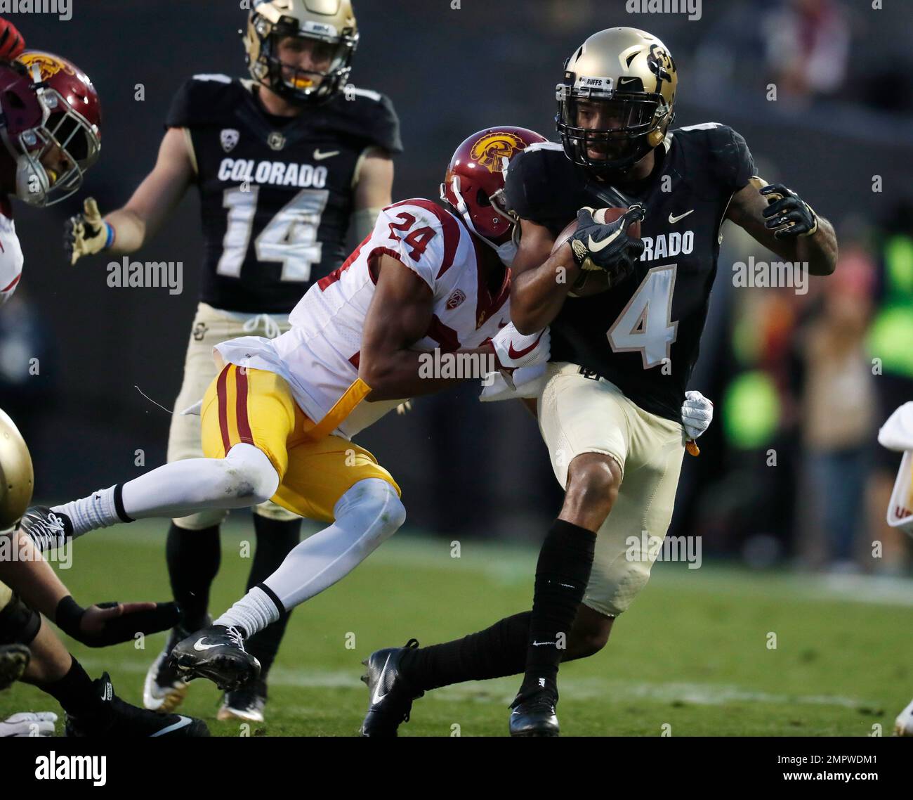 USC Trojans cornerback Isaiah Langley (24) pulls down Colorado ...