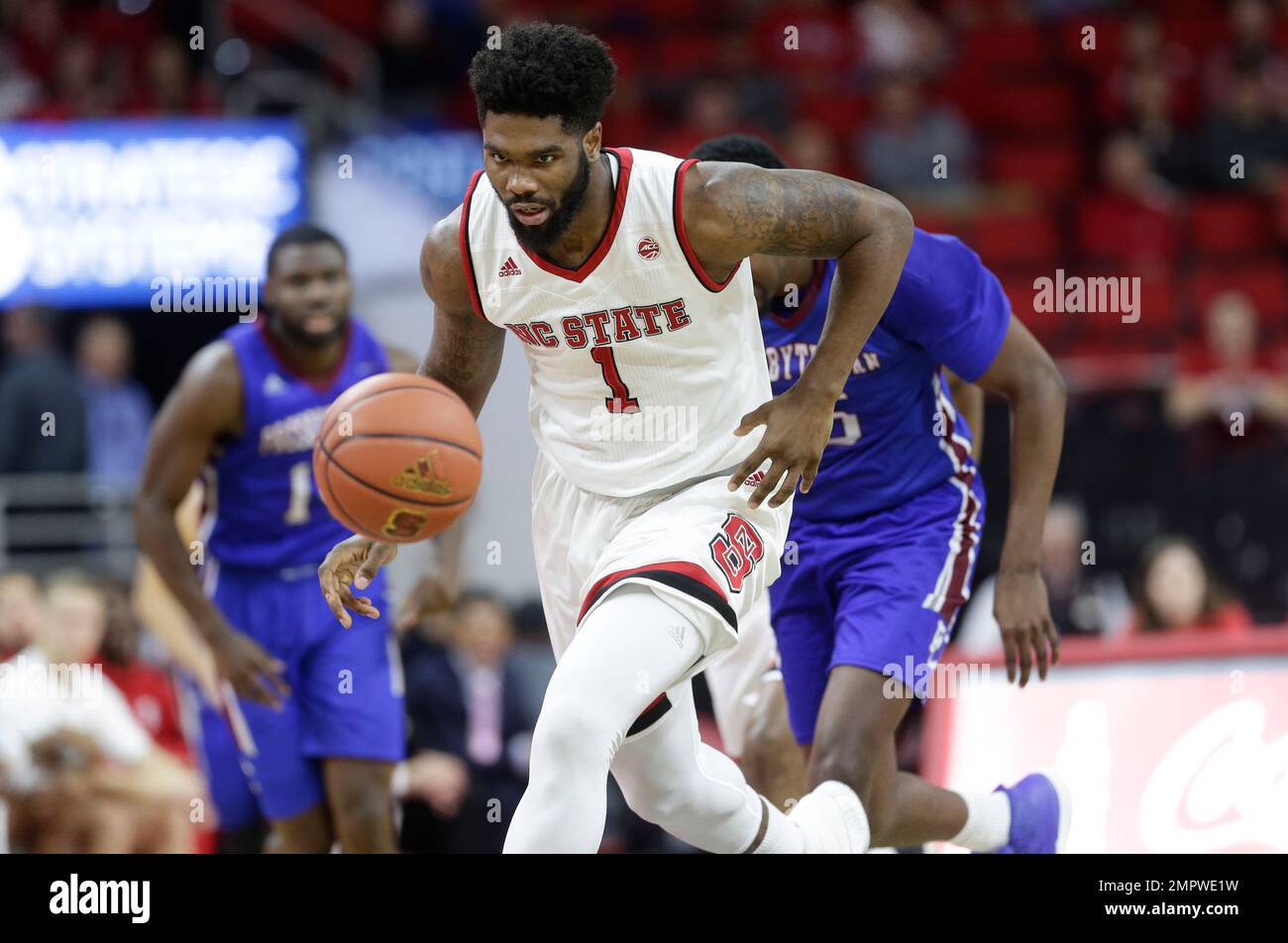 North Carolina State's Lennard Freeman (1) dribbles the ball against ...