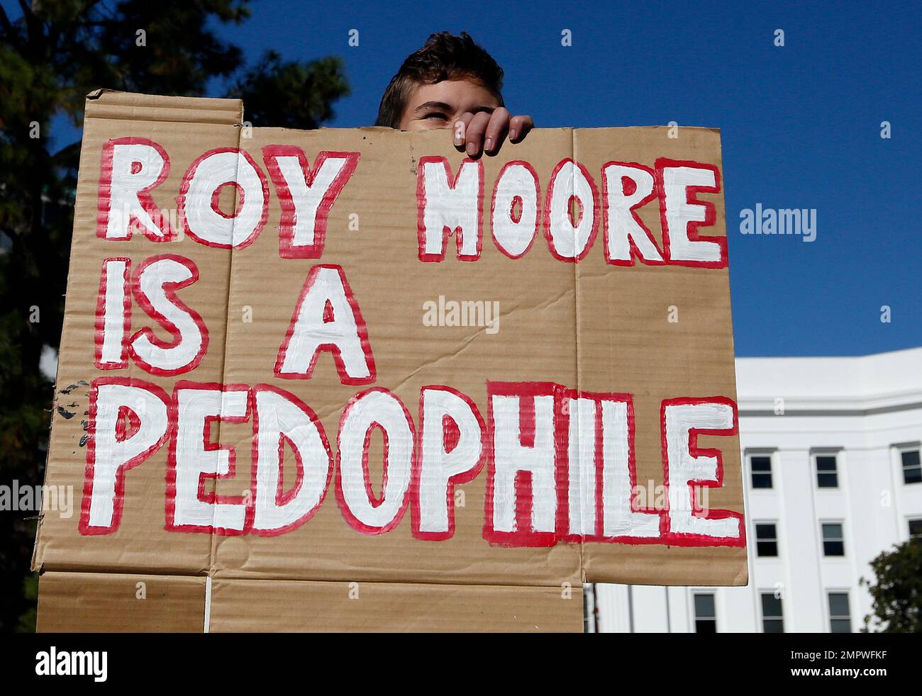 Rose Falvey, 25, of Montgomery, stands outside the Alabama State ...