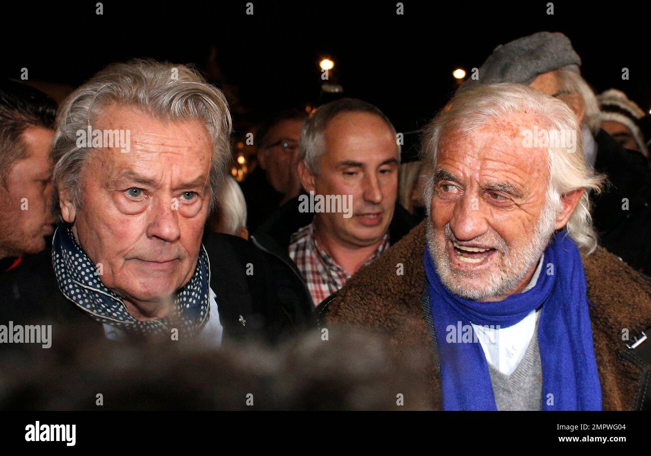 French actors Alain Delon, left, and Jean Paul Belmondo, center, right ...