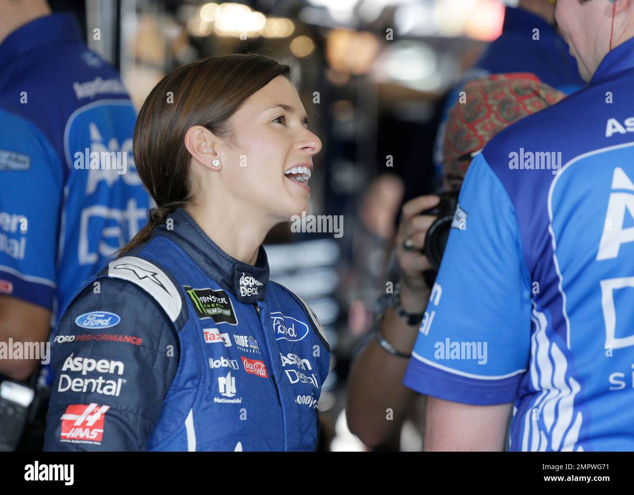 Danica Patrick smiles in the garage during practice for Sunday's NASCAR ...