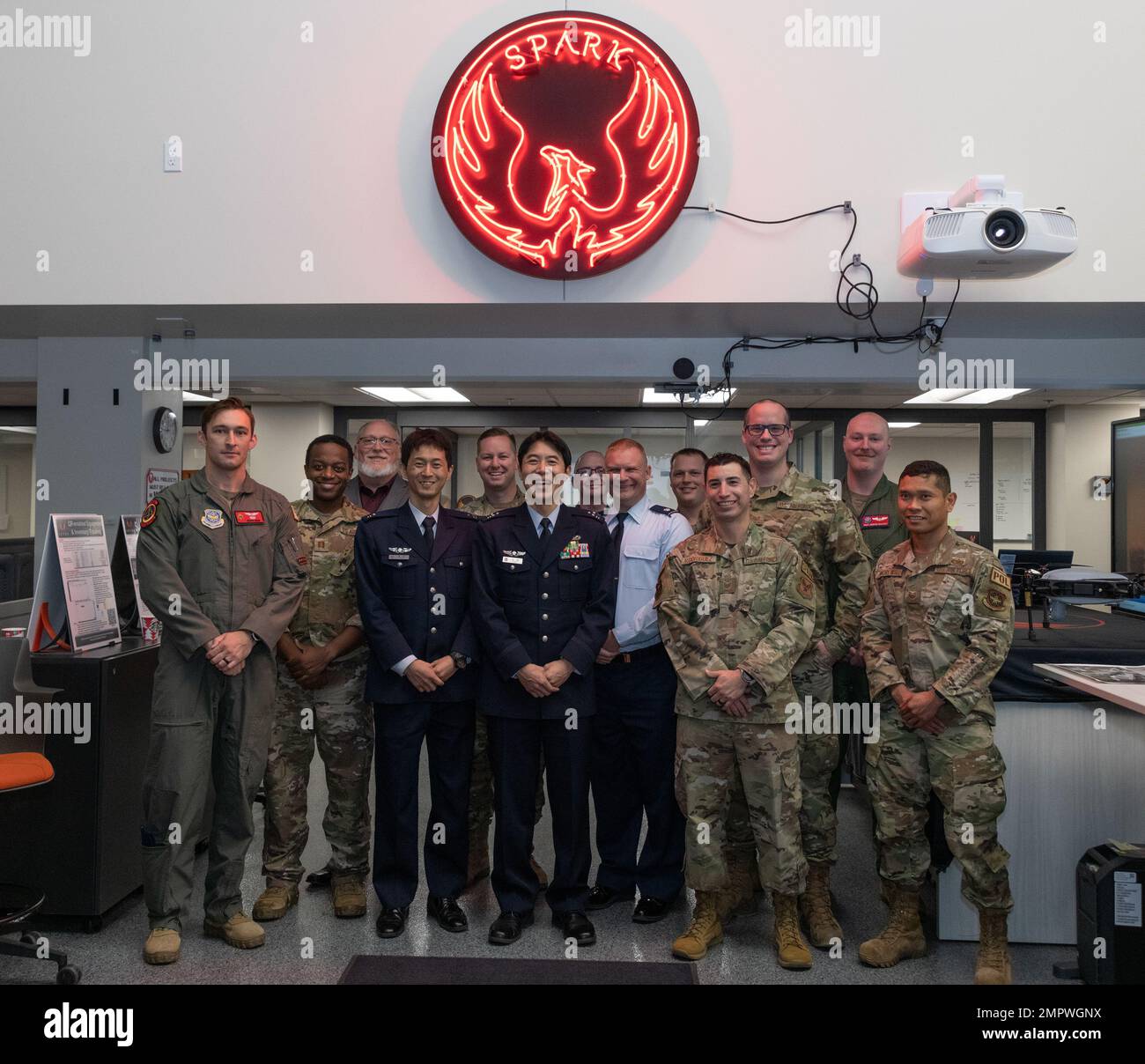 Airmen associated with the Phoenix Spark Innovation Lab take a group ...