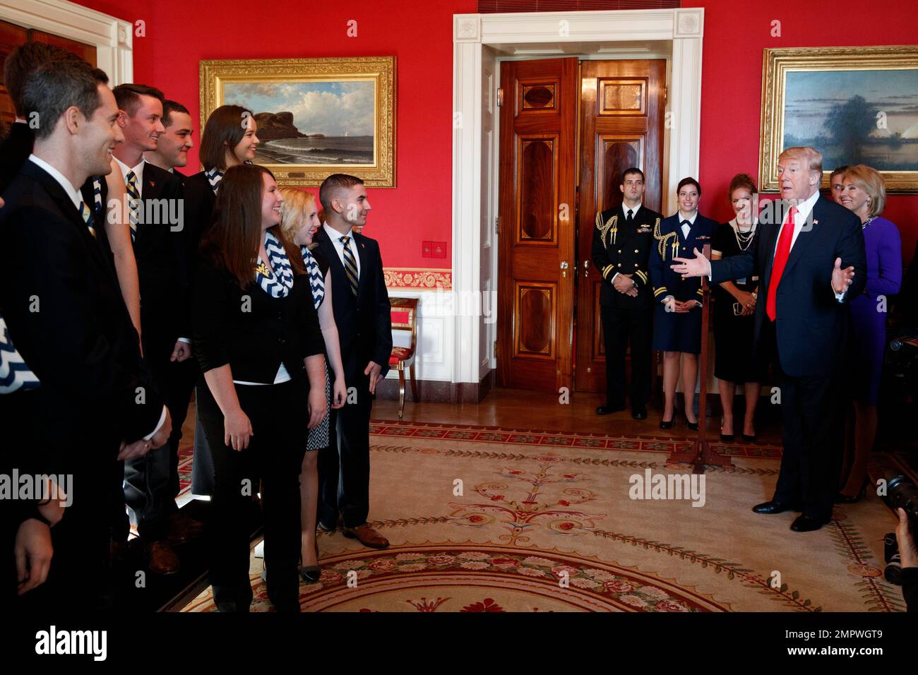 President Donald Trump greets the West Virginia University rifle team ...