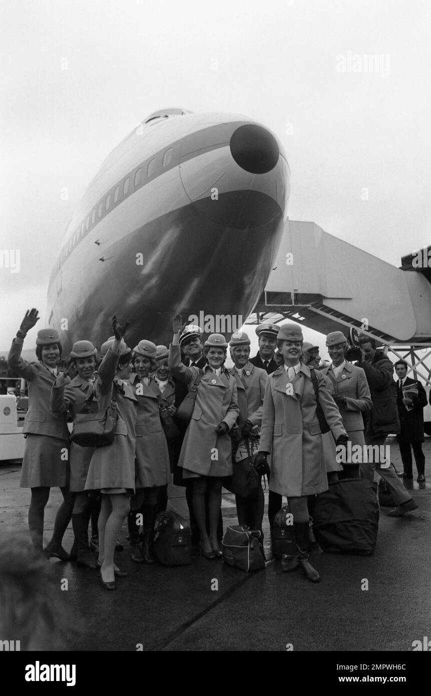 FILE - The crew of a Boeing 747 Jumbo Jet pose in front of the nose of ...