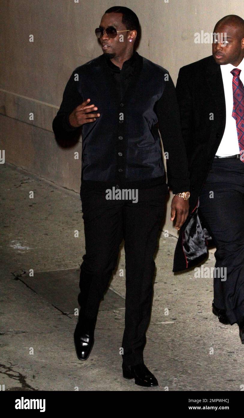 The ever fashionable Sean "Diddy" Combs wears a velvet-like black ...