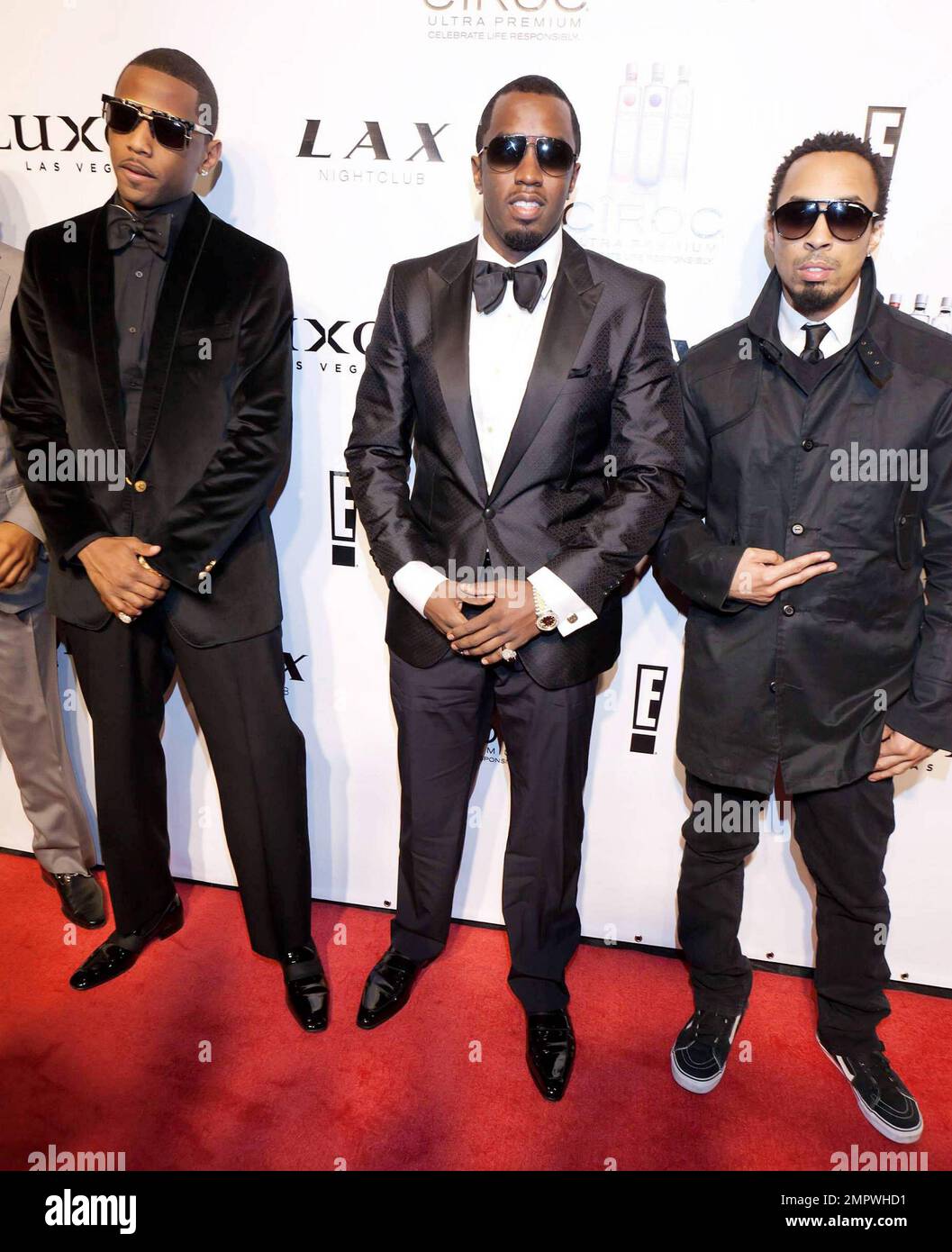 Sean Combs (aka Diddy) shows off his massive diamond rings and flashy tuxedo as he walks the red ...