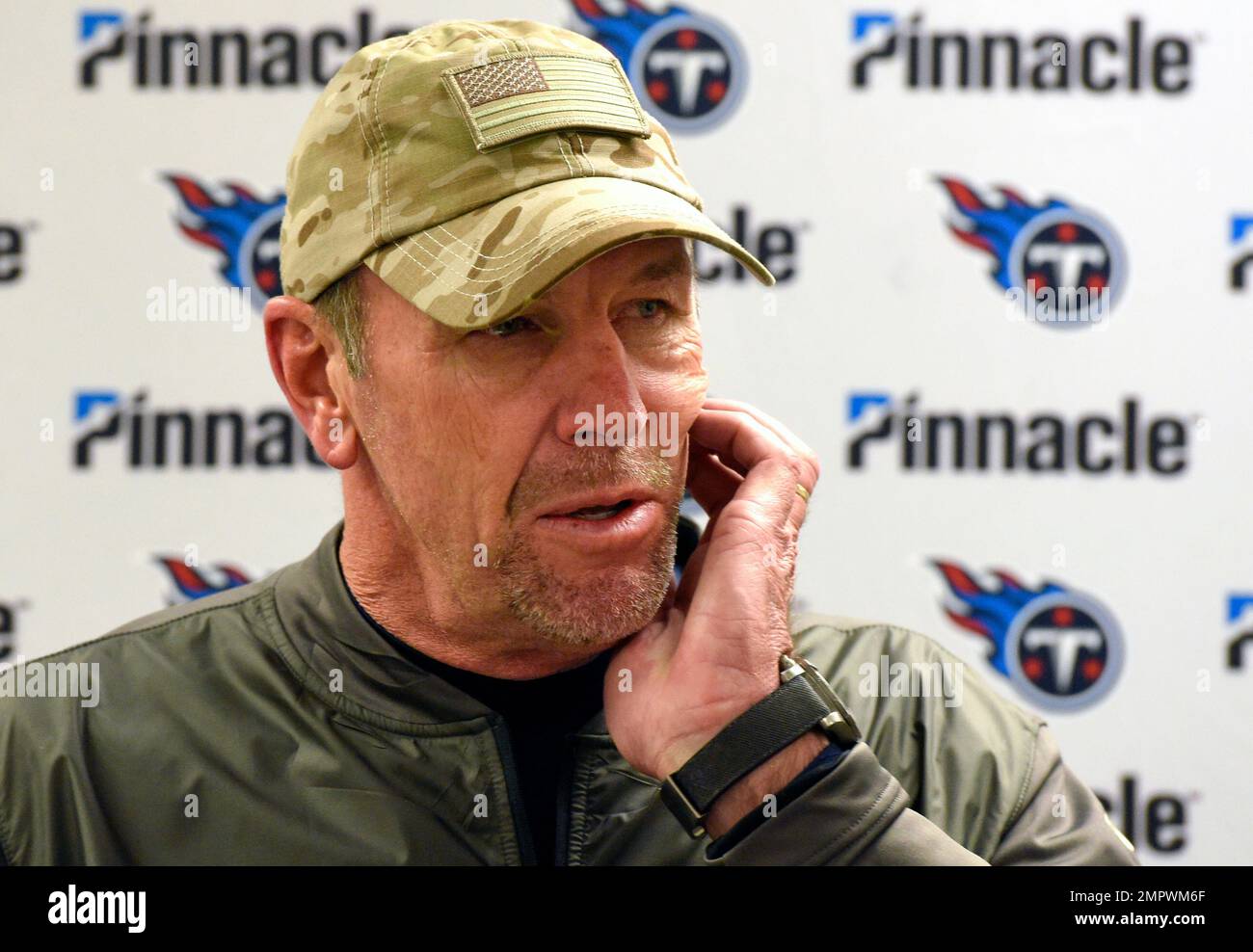 Tennessee Titans coach Mike Mularkey answers a question early Friday ...