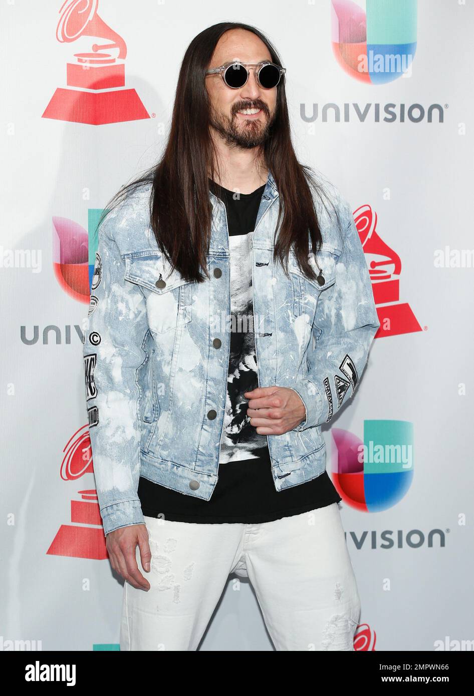 Steve Aoki poses in the press room at the 18th annual Latin Grammy ...