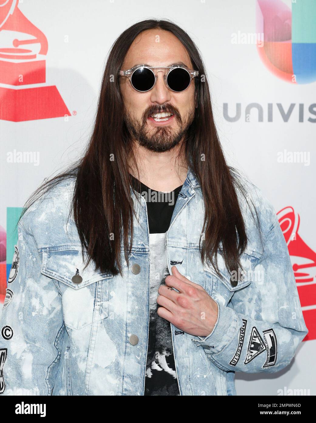 Steve Aoki poses in the press room at the 18th annual Latin Grammy ...