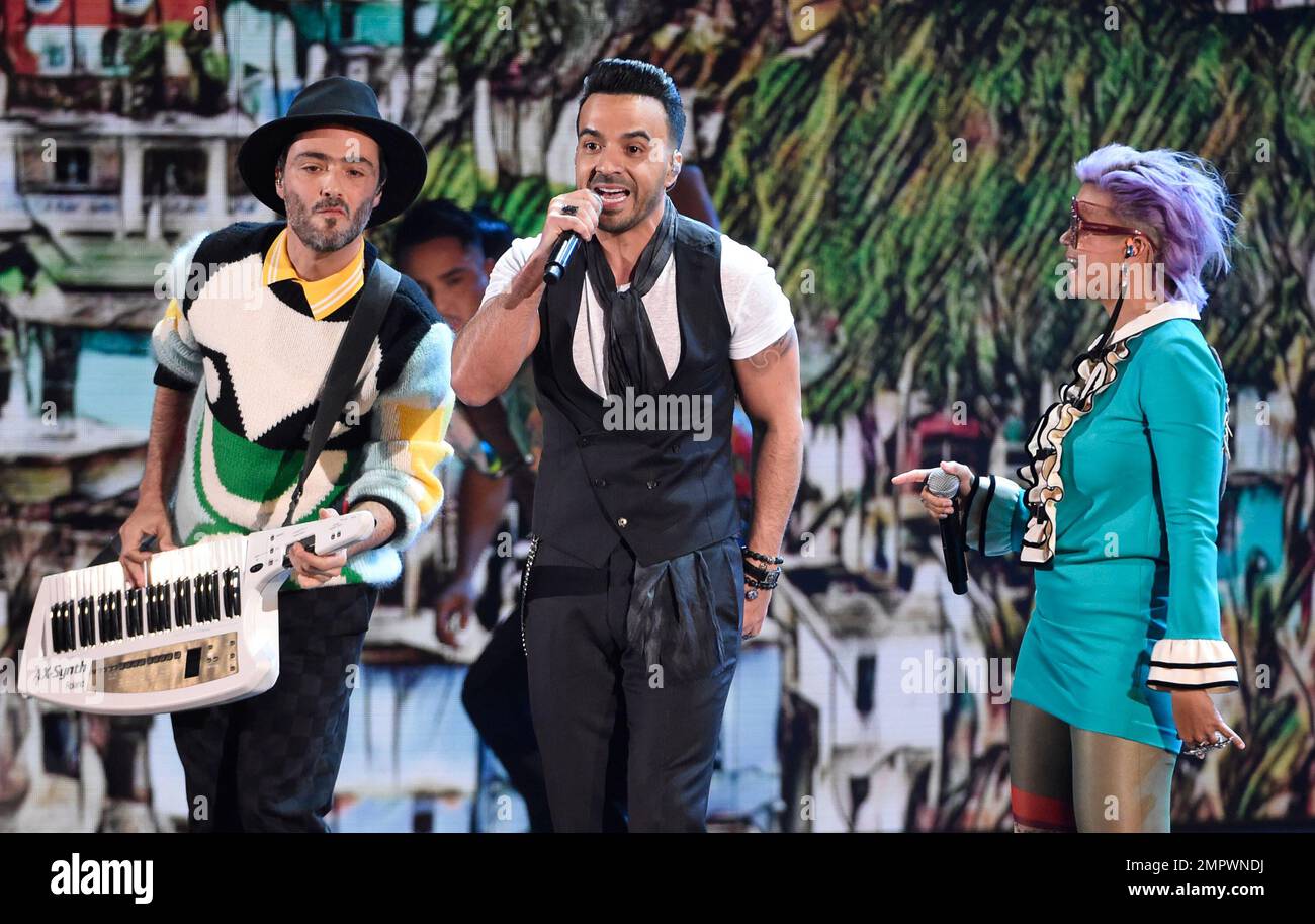 Simon Mejia, from left, Luis Fonsi and Li Saumet perform "Despacito" at ...