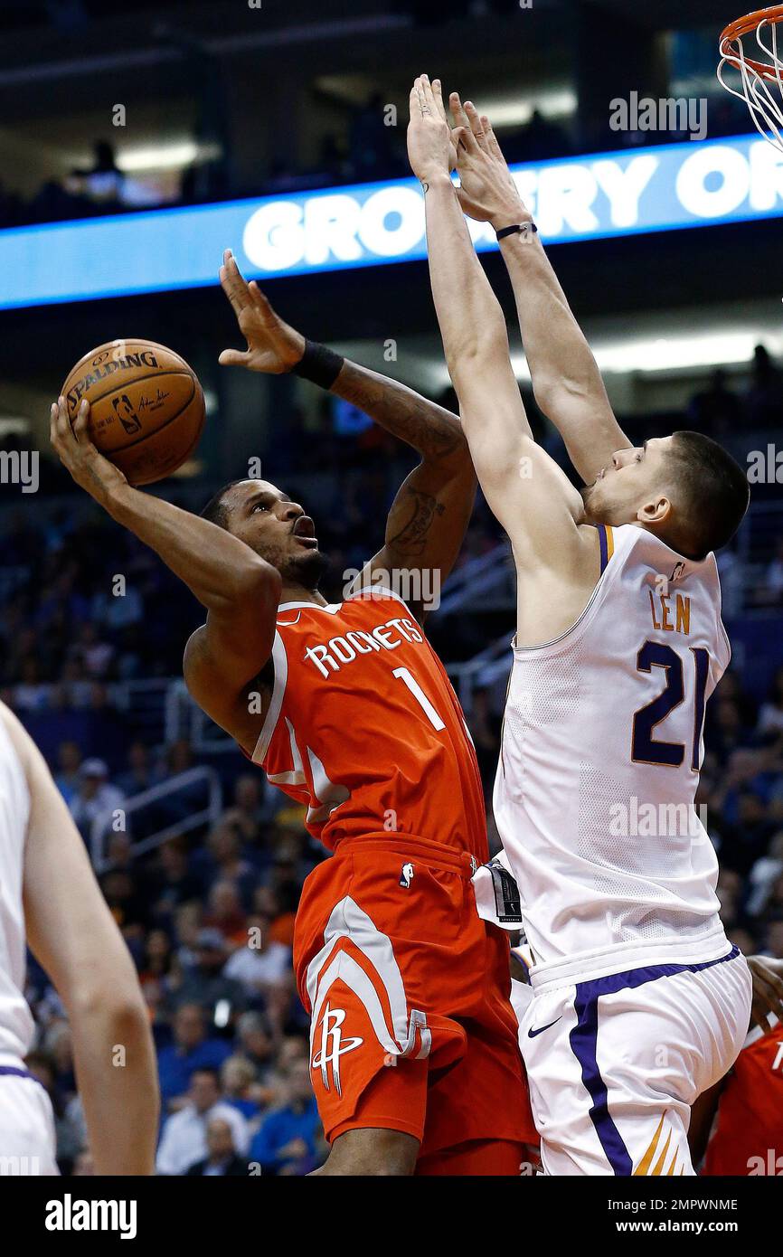 Houston Rockets forward Trevor Ariza (1) tries to get off a shot over ...