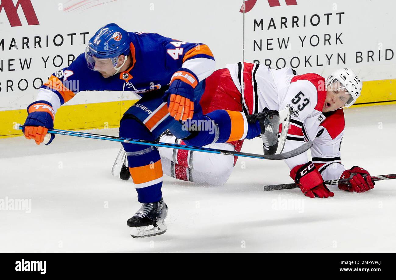 New York Islanders defenseman Calvin de Haan (44) collides with ...