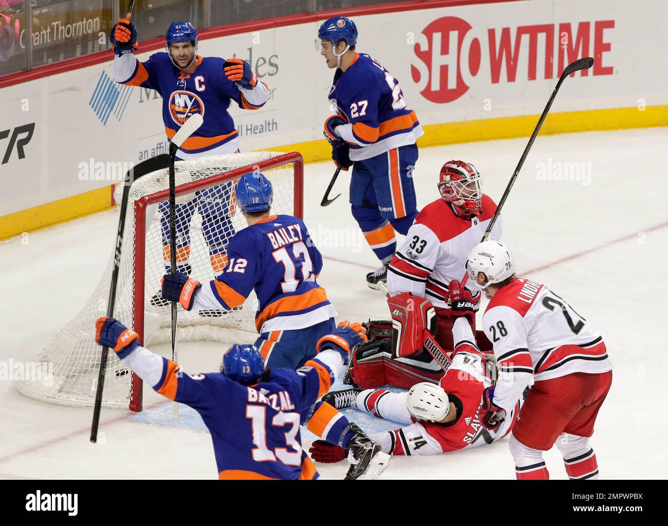 The New York Islanders celebrate a goal by right wing Josh Bailey (12 ...