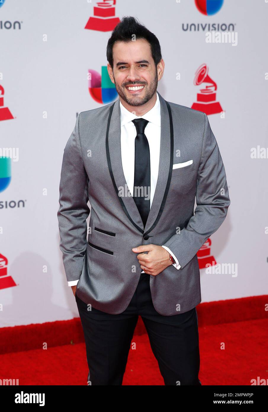 Manny Cruz arrives at the 18th annual Latin Grammy Awards at the MGM ...