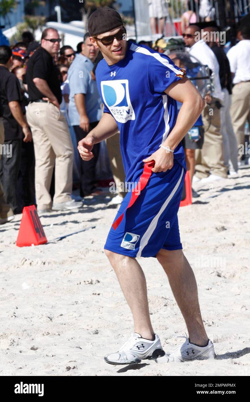 Kellan Lutz plays in the Fourth Annual DirecTV Celebrity Beach Bowl at ...