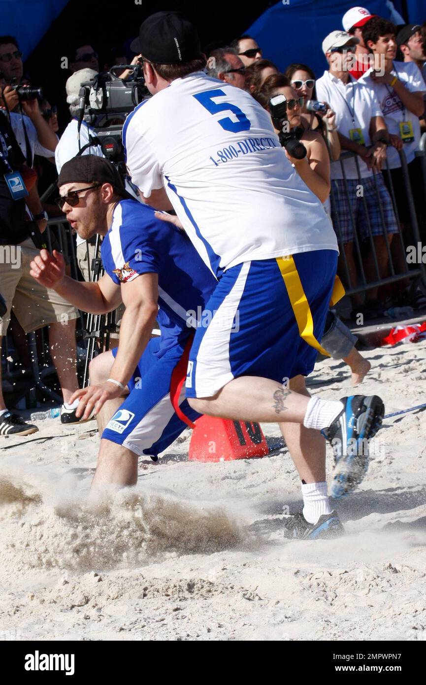 Kellan Lutz plays in the Fourth Annual DirecTV Celebrity Beach Bowl at ...
