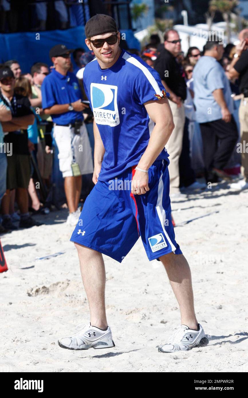 Kellan Lutz plays in the Fourth Annual DirecTV Celebrity Beach Bowl at ...