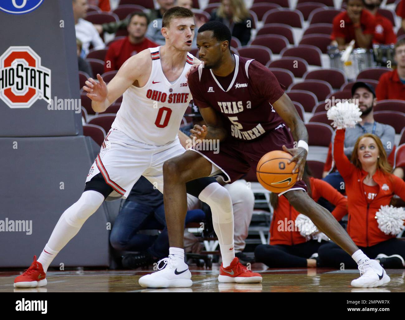 Texas Southern's Trayvon Reed, right, works against Ohio State's Micah ...